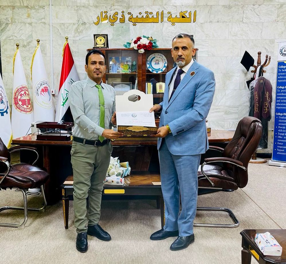 The Dean of the Technical College of Dhi Qar honors the Head of the ...